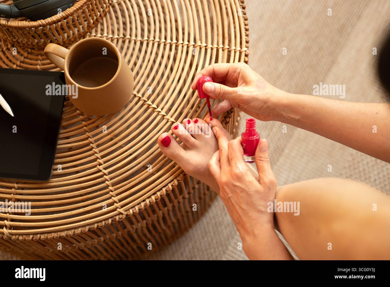 Feet toes pedicure coffee table hi-res stock photography and images - Alamy