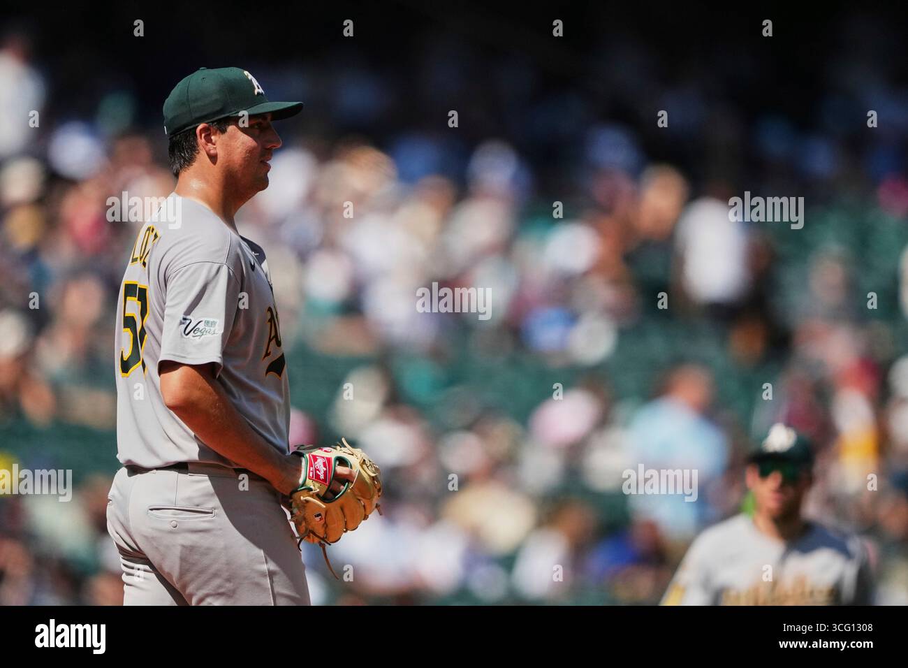 Athletics starting pitcher Jacob Lopez looks on during a baseball game ...