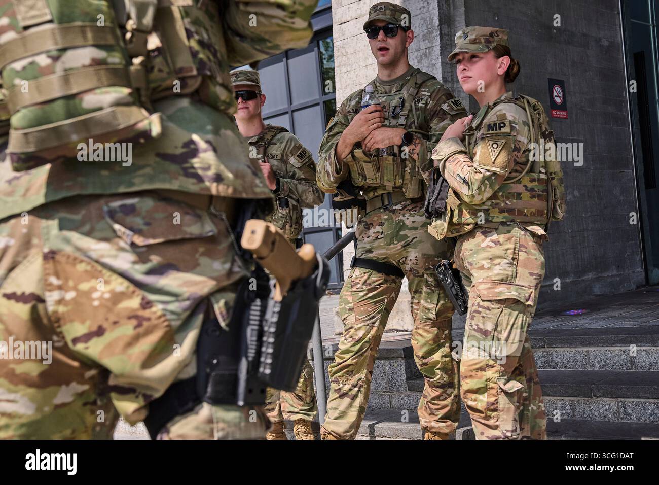 Armed members of the Ohio National Guard patrol The Wharf, Monday, Aug ...