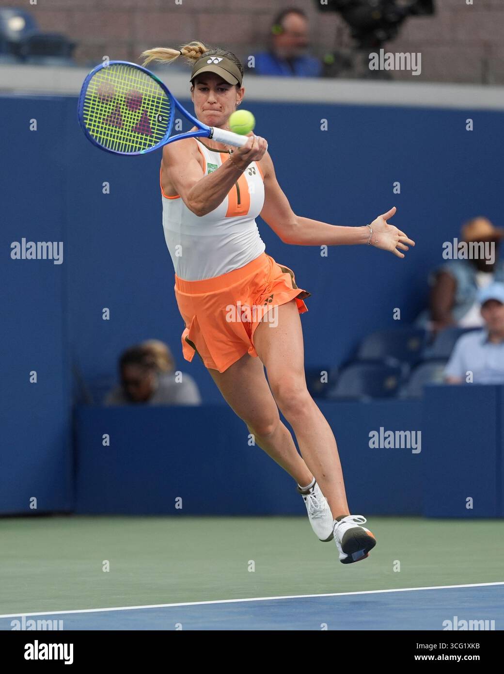 Anna Bondar, of Hungary, returns a shot to Elina Svitolina, of Ukraine ...