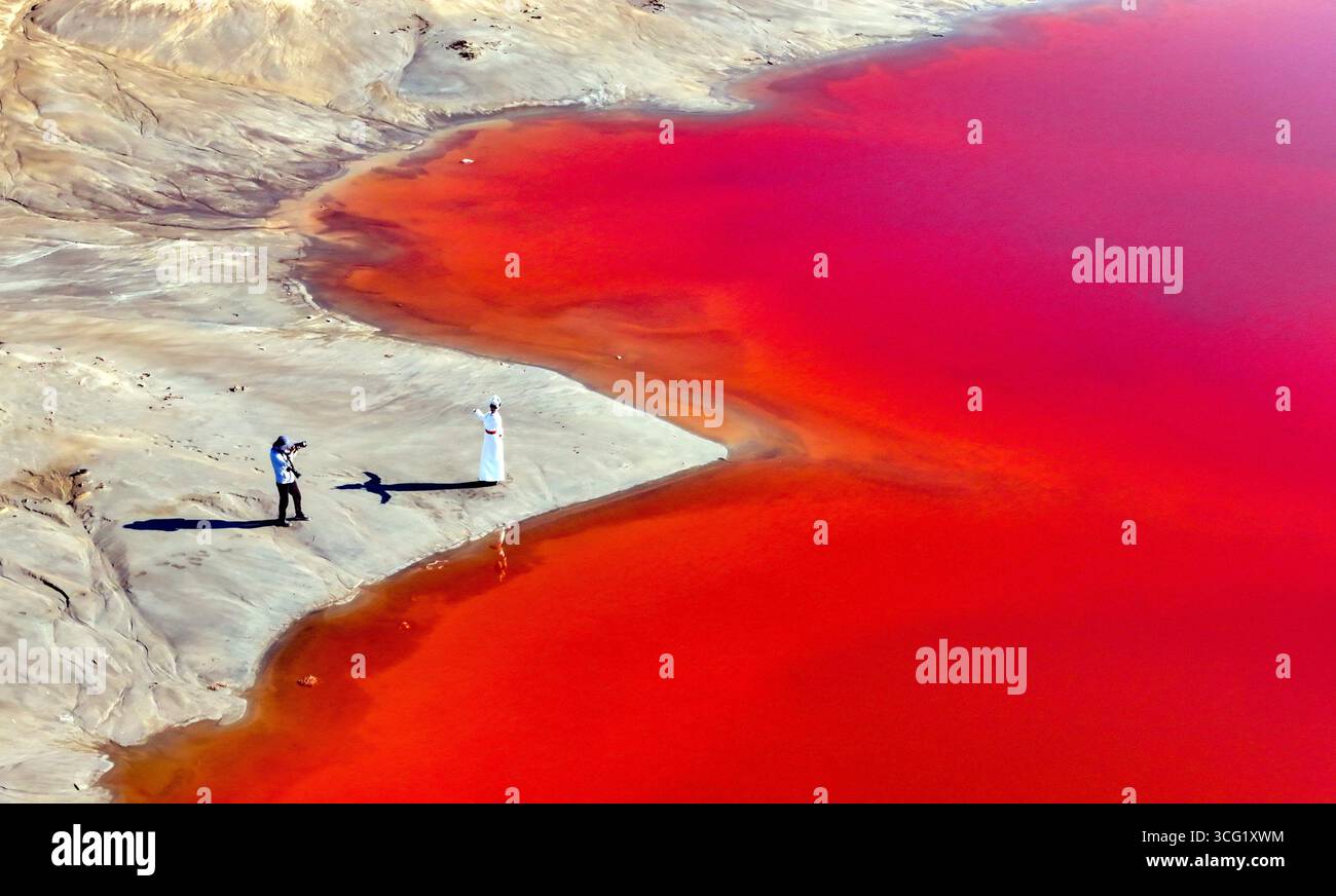 ORDOS, CHINA - AUGUST 25, 2025 - Tourists are visiting Mangnai Naoer ...