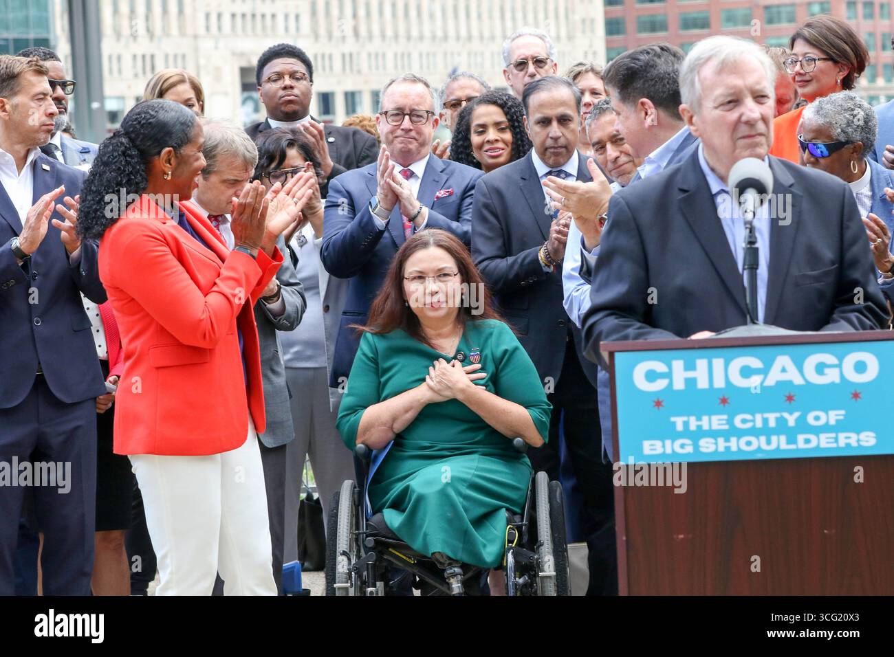U.S. Senator Dick Durbin praises U.S. Senator Tammy Duckworth during a ...