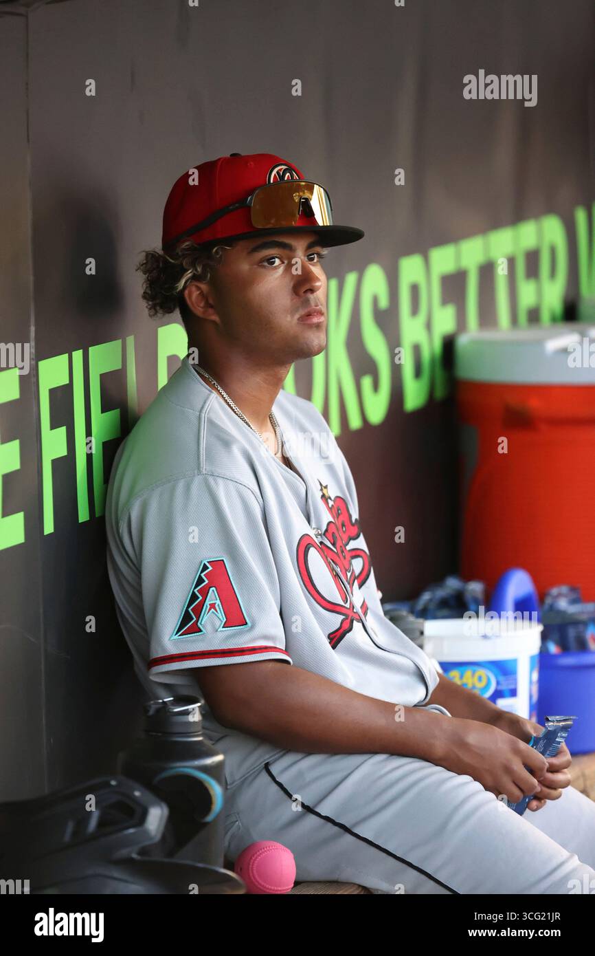 Kayson Cunningham (3) of the Visalia Rawhide watches frim the dugout ...