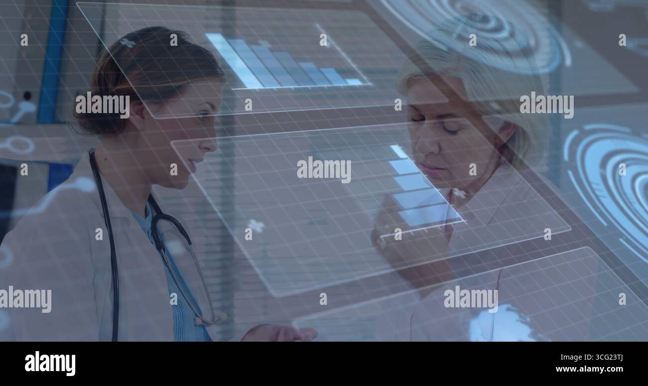 Healthcare professionals review medical charts hi-res stock photography ...