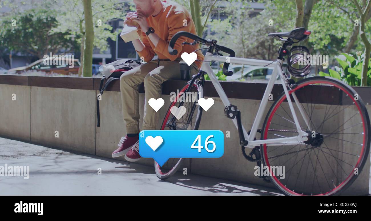 Eating cyclist in orange hi-res stock photography and images - Alamy