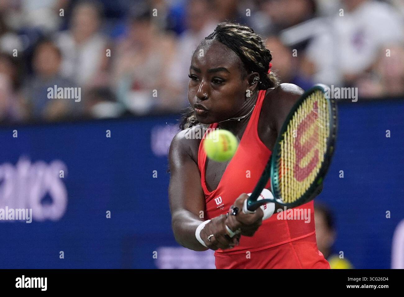 Alycia Parks, of the United States, returns a shot to Mirra Andreeva ...