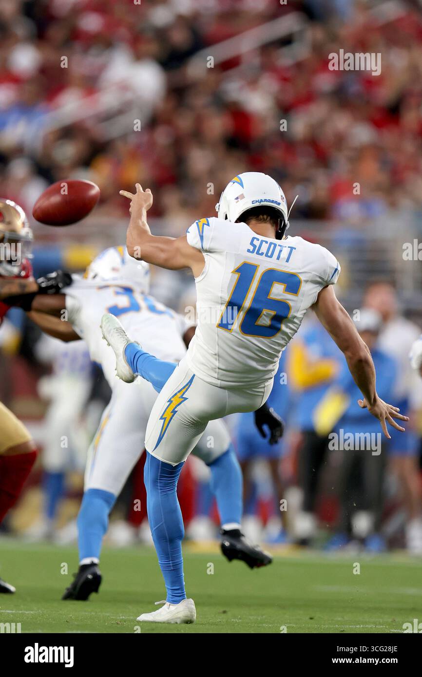 Los Angeles Chargers punter JK Scott (16) kicks during an NFL football ...