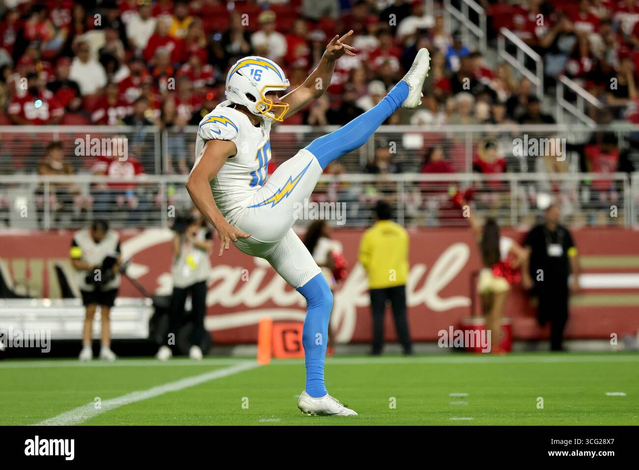 Los Angeles Chargers punter JK Scott (16) kicks during an NFL football ...