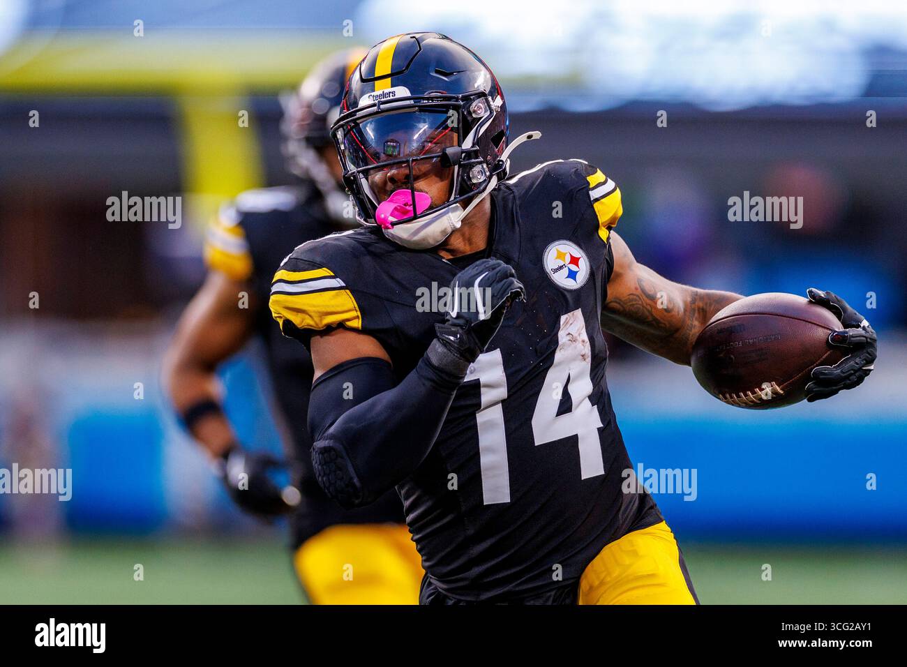 Pittsburgh Steelers running back Kenneth Gainwell (14) runs the ball ...