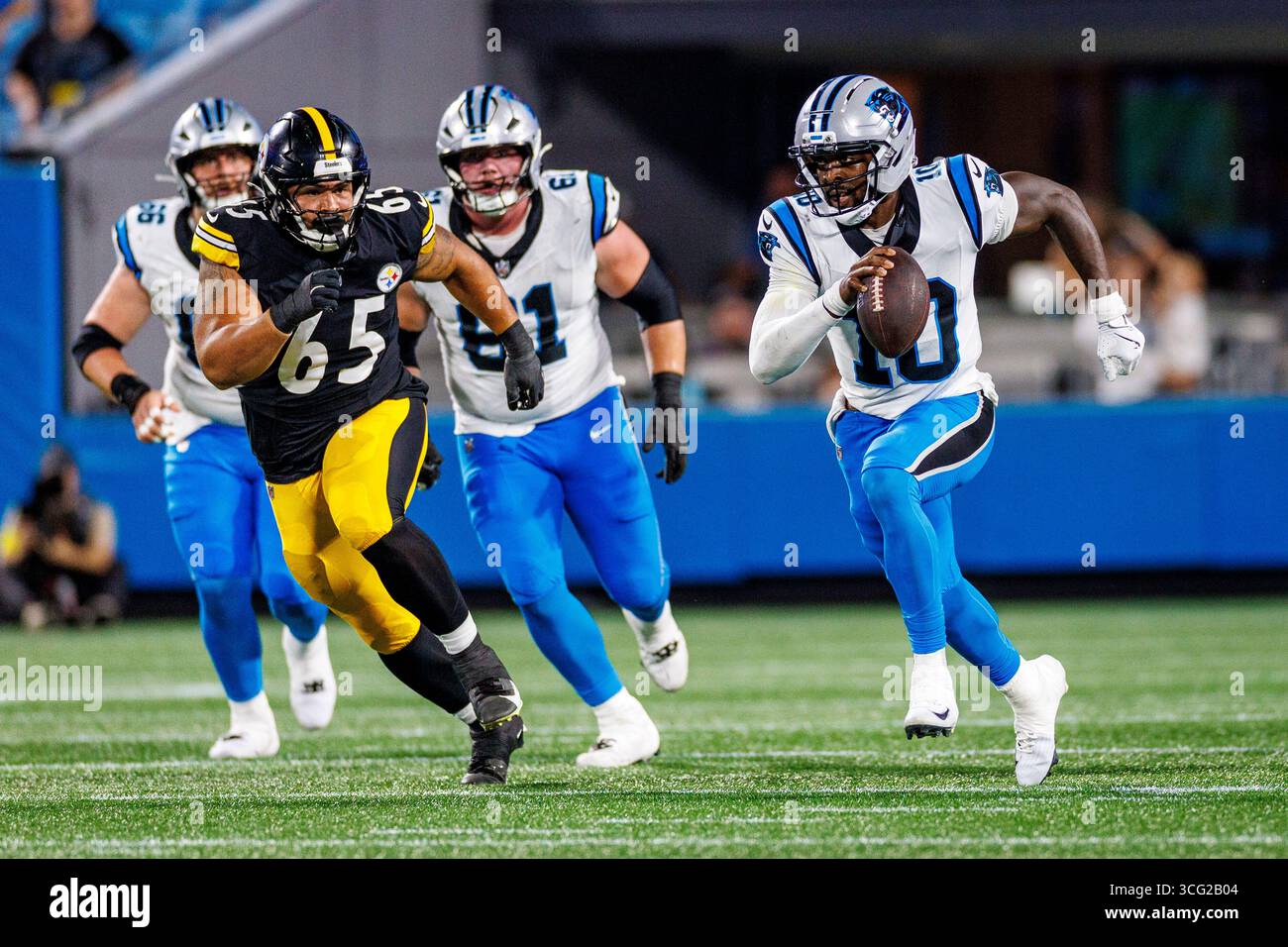 Carolina Panthers quarterback Bryce Perkins (10) runs the ball past ...