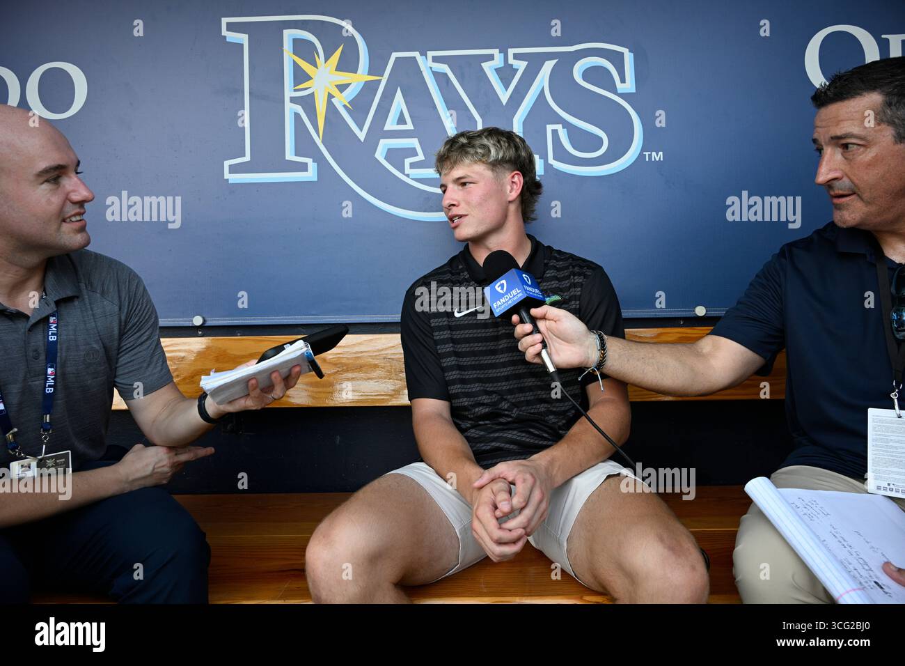 Tampa Bay Rays first-round draft pick Daniel Pierce, center, talks with ...