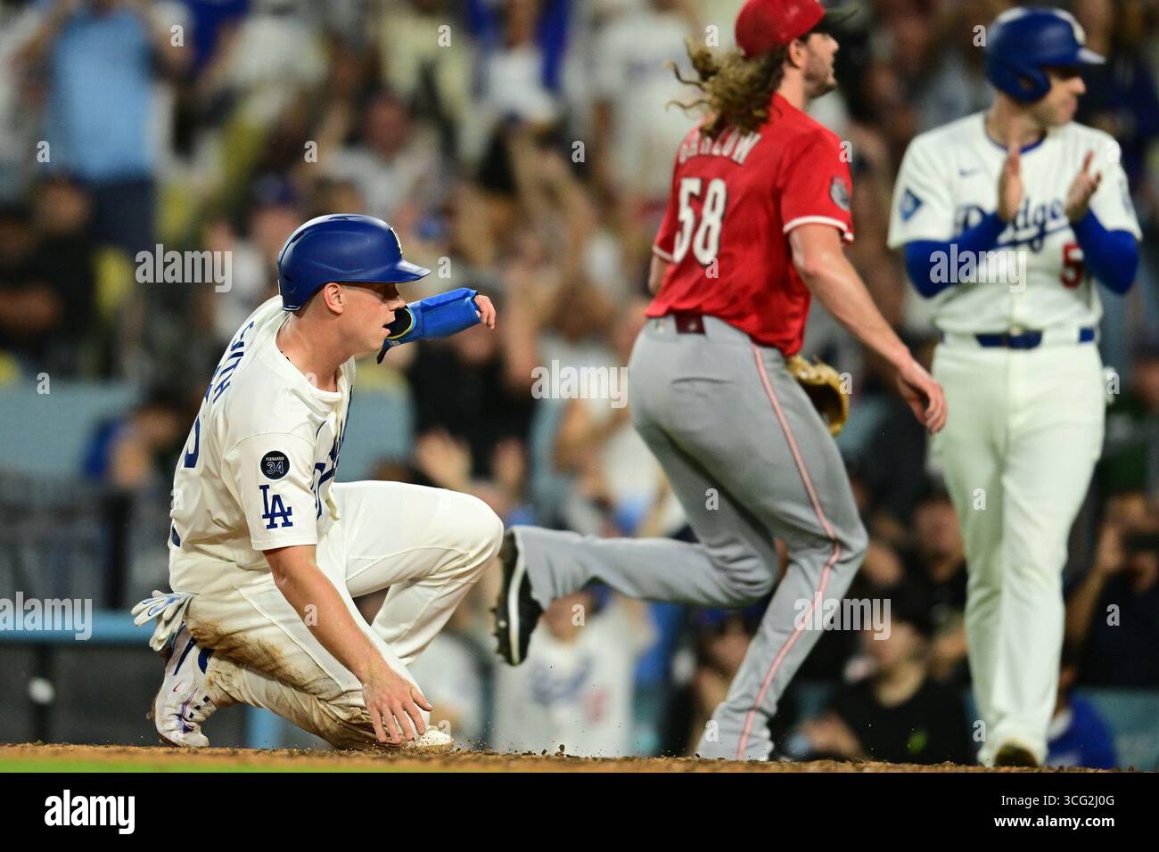 Los Angeles Dodgers Will Smith (16) is safe at home on a throwing error ...