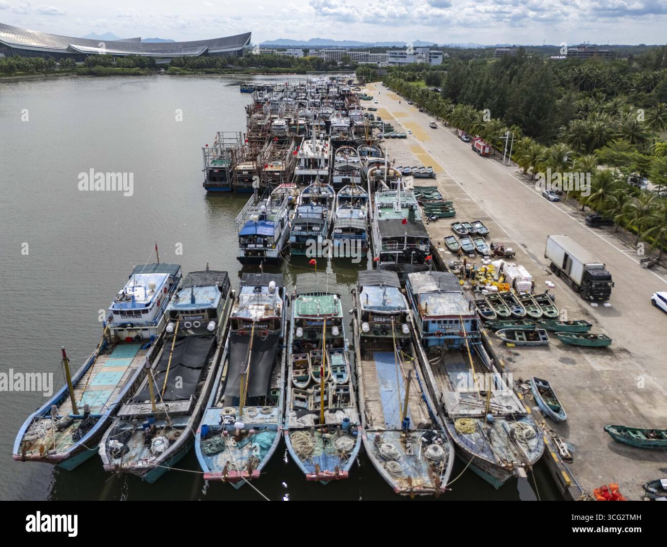 Aerial photo shows fishing vessels anchoring at a harbor to avoid ...