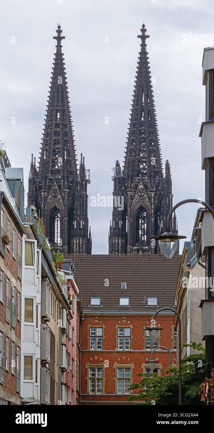Street view of the Cologne Cathedral towering above the surrounding ...