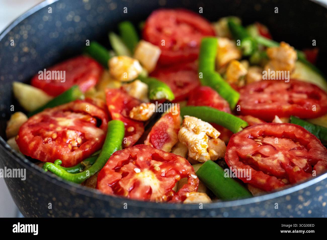 Sauteed cherry tomato hi-res stock photography and images - Alamy