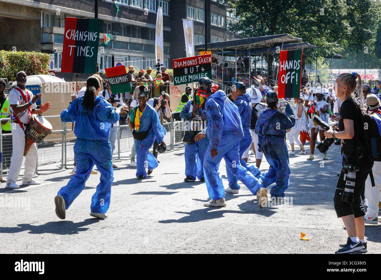 London, UK, 25th Aug 2025. A performance group highlight diamond mining ...