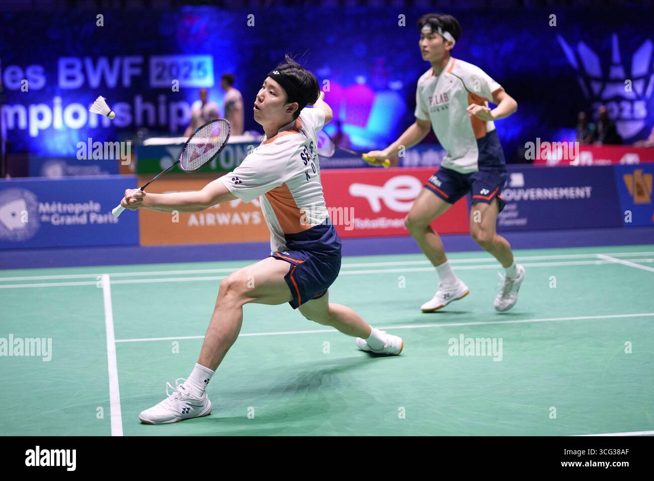South Korea's Won Ho Kim, right, and Seung Jae Set play Singapore' s Koh Eng Keat Wesley and ...