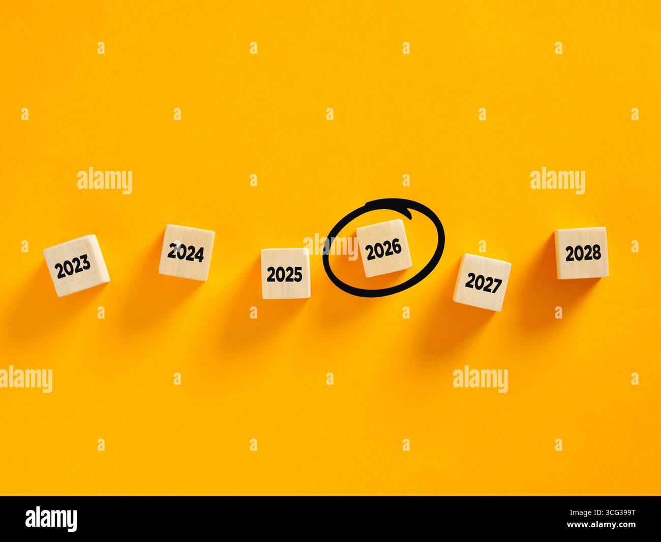 Wooden cubes showing years from 2023 to 2028 with year 2026 highlighted ...