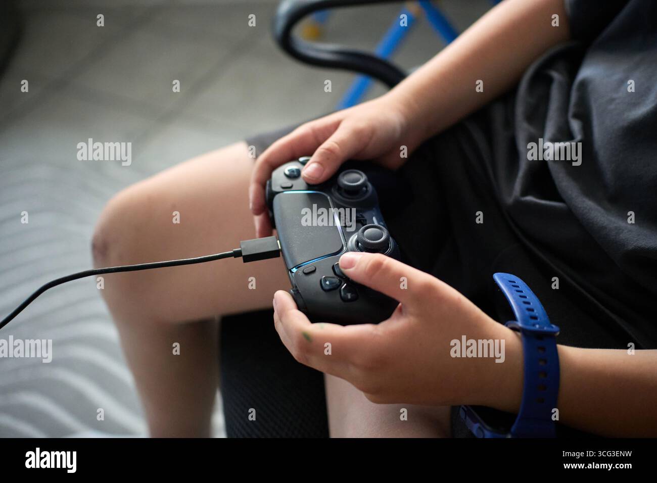 Gamer sits comfortably on chair hi-res stock photography and images - Alamy