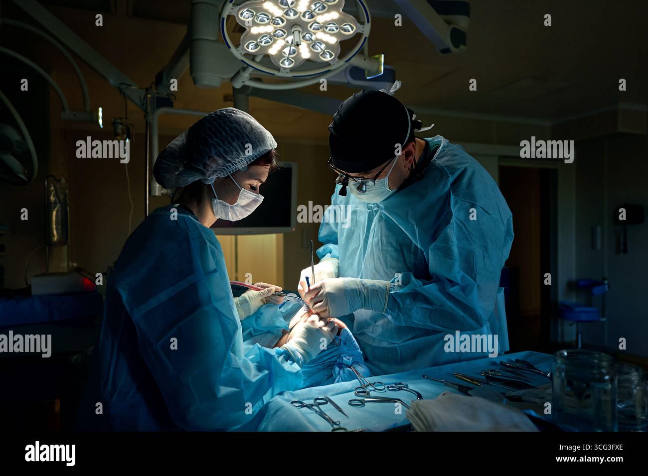 Surgeons uniform perform operation hi-res stock photography and images ...