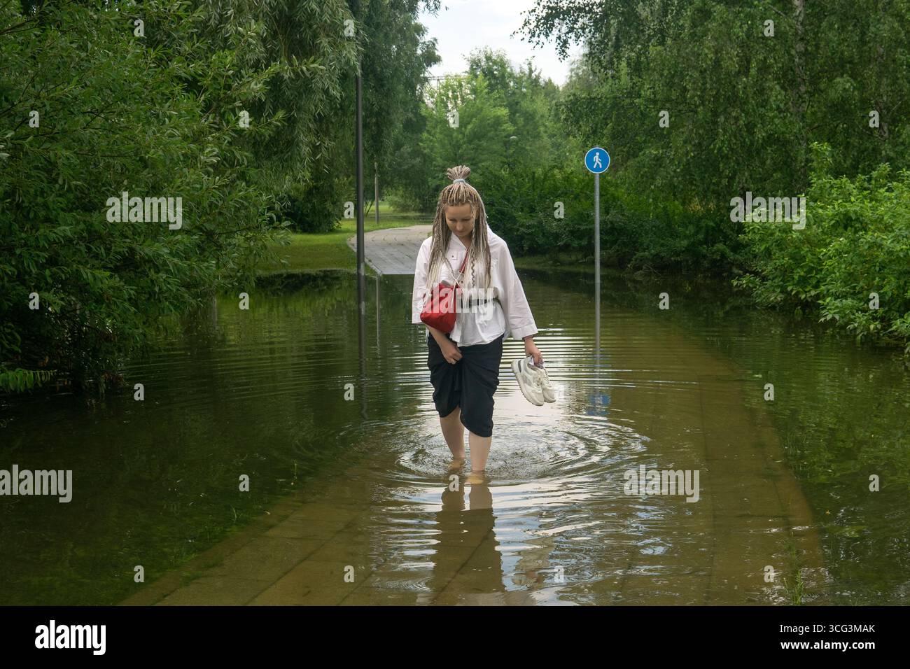 Walking on flooded path hi-res stock photography and images - Alamy