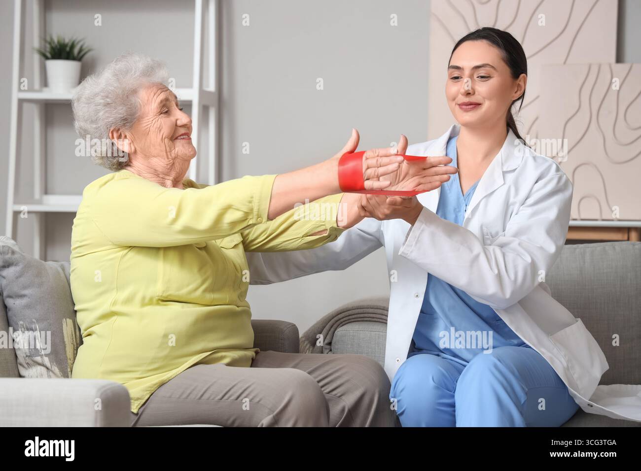 Physiotherapy help stretching band hi-res stock photography and images ...