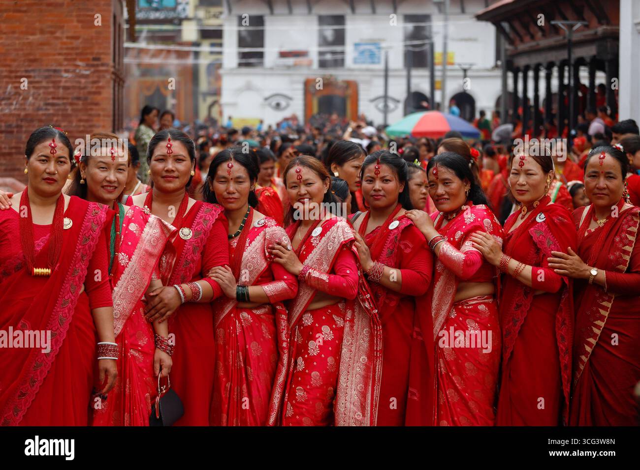On August 26, 2025, in Kathmandu, Nepal. Nepalese women in red attire ...
