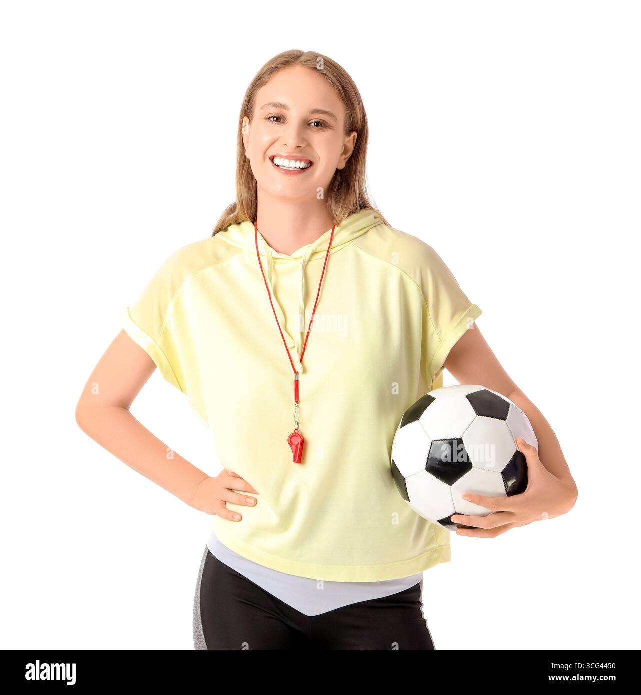 Female PE teacher with soccer ball on white background Stock Photo - Alamy