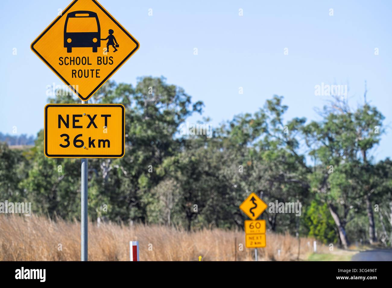 Rural school bus route road sign, back to school in outback Queensland ...