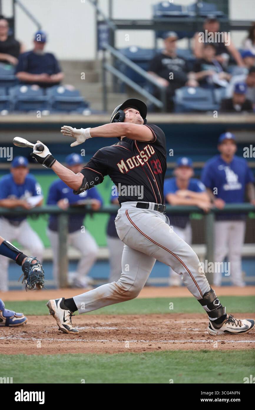 Luke Stevenson (33) of the Modesto Nuts bats against the Rancho ...