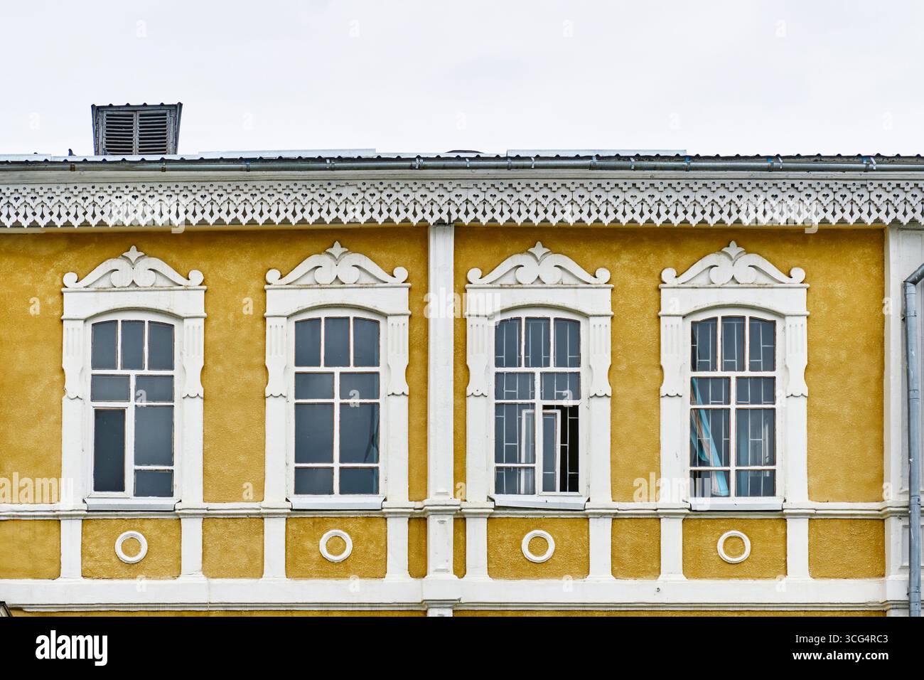 Arched second-floor windows in traditional Russian vernacular style on ...