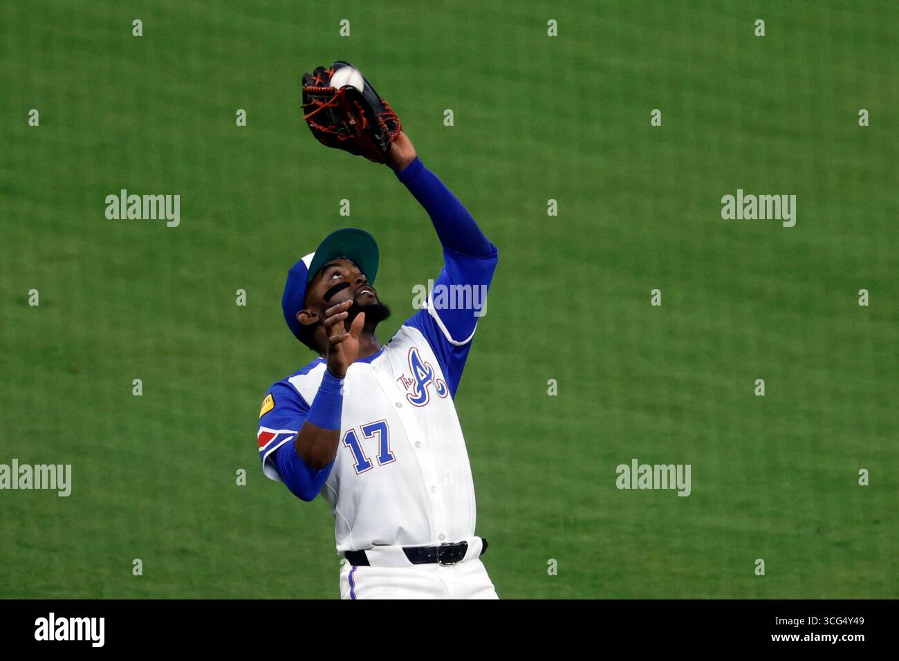 Atlanta Braves third baseman Vidal Bruján catches a pop fly for the out ...