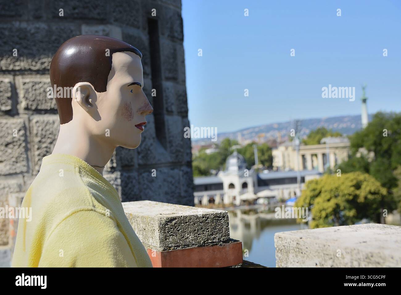 Mannequin enjoys the panoramic view of budapest from the historical ...