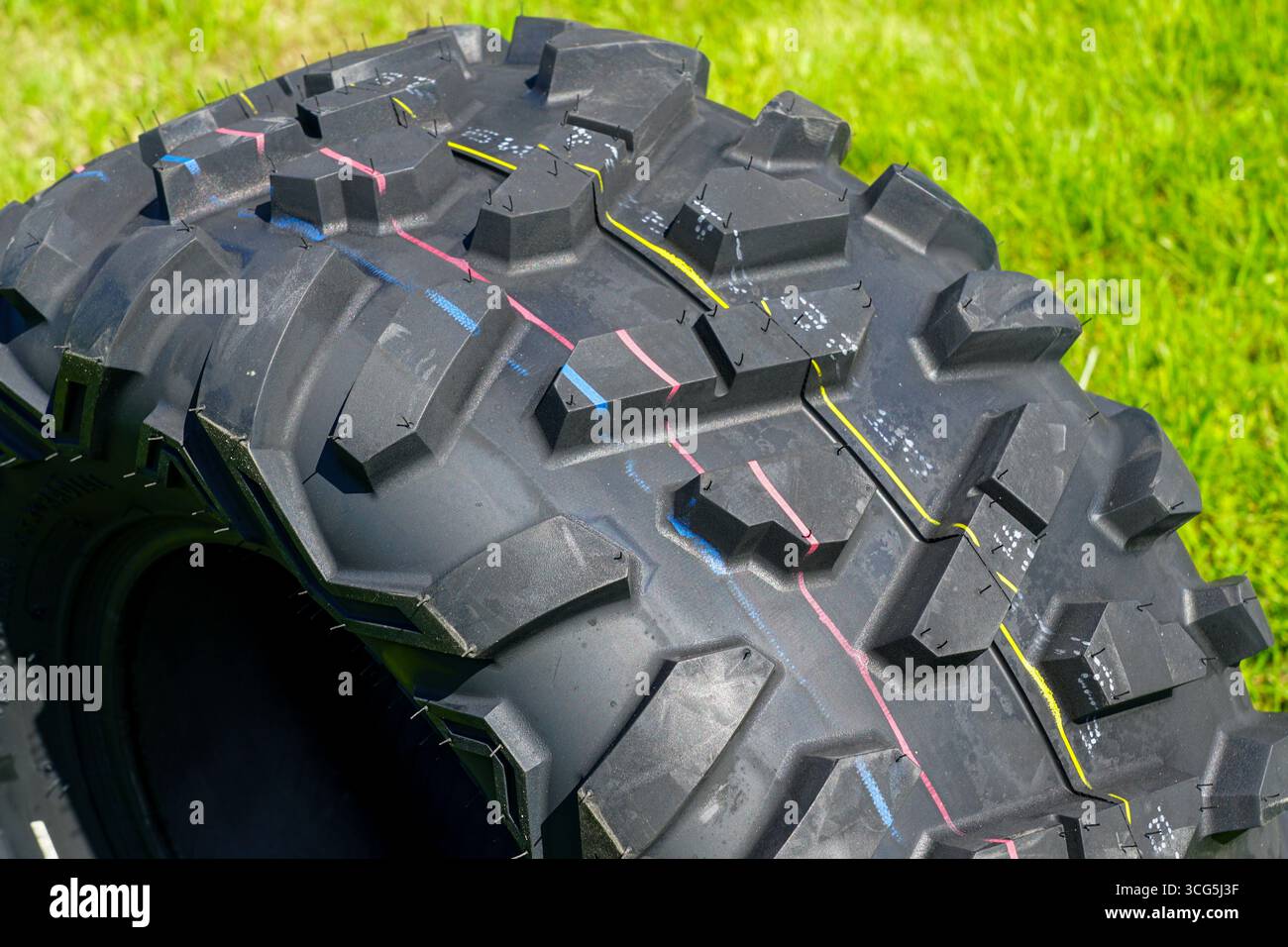 Detailed close-up of an all-terrain vehicle ATV tire showing rugged ...
