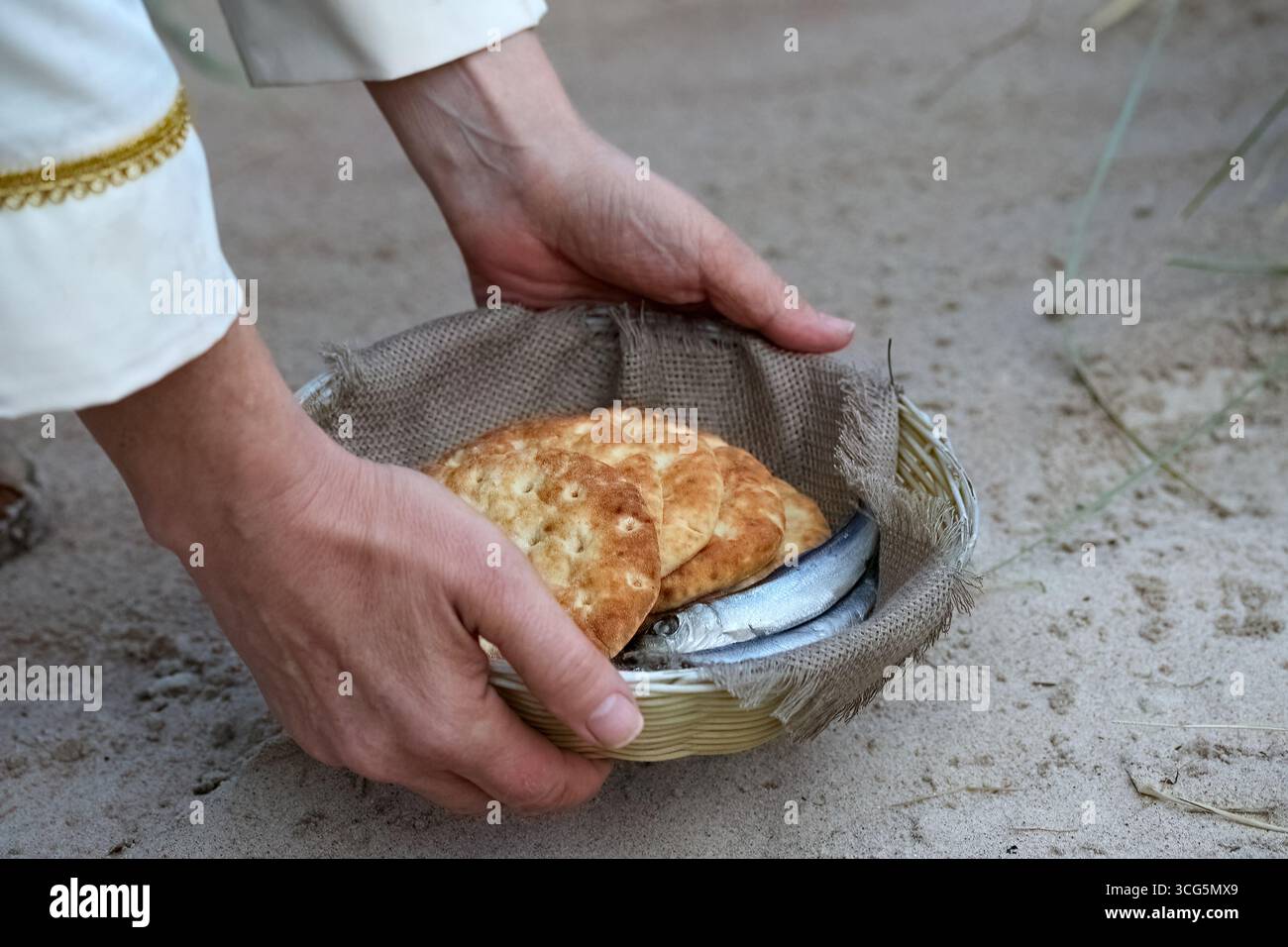 Christianity, religion, Bible concept. Five loaves of bread and two ...