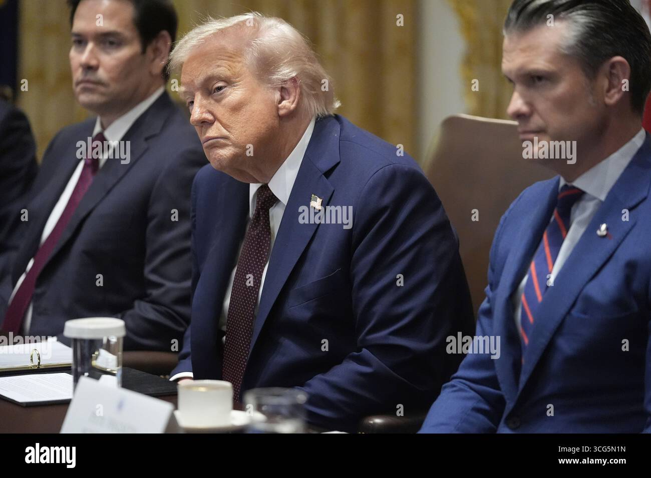 President Donald Trump, Secretary of State Marco Rubio, left, and ...