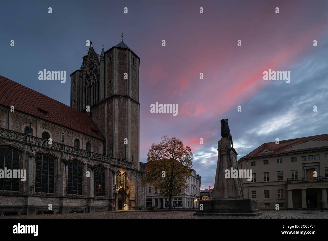 Historic Brunswick Cathedral and the iconic lion statue in front ...