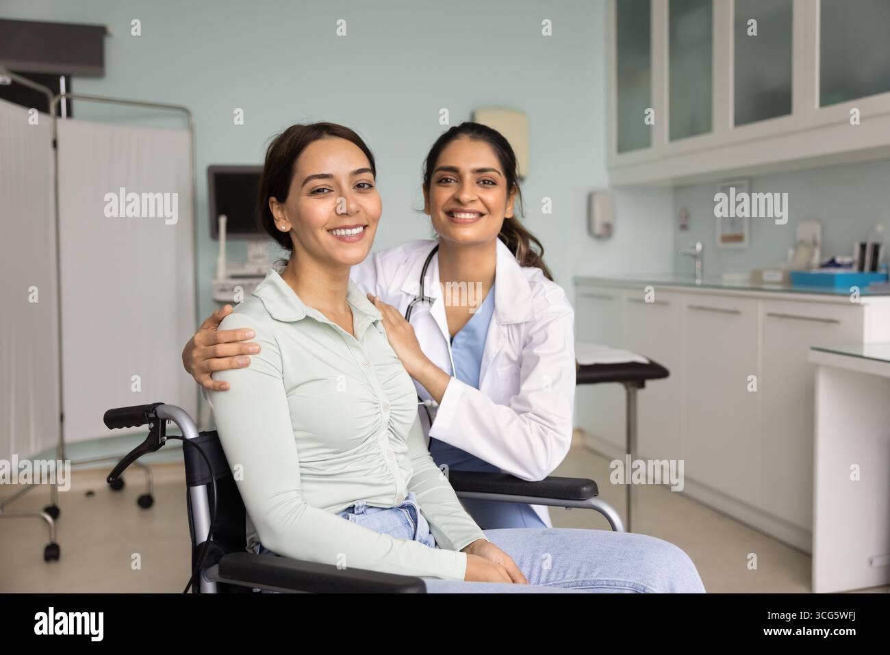 Happy empathetic trauma surgeon doctor embracing patient with ...