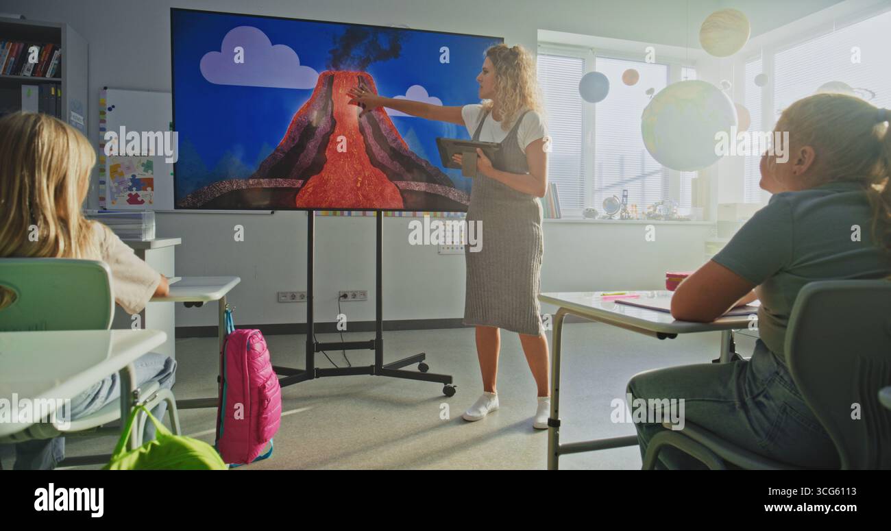 Female teacher explaining basic information hi-res stock photography ...