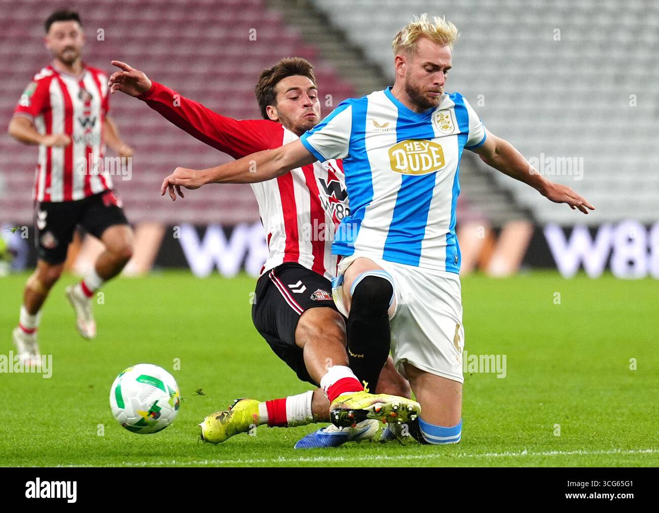 Sunderland's Marc Guiu and Huddersfield Town's Jack Whatmough battle ...