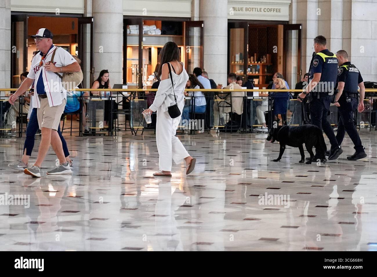 Amtrak Police officers patrol Union Station, Tuesday, Aug. 26, 2025, in ...