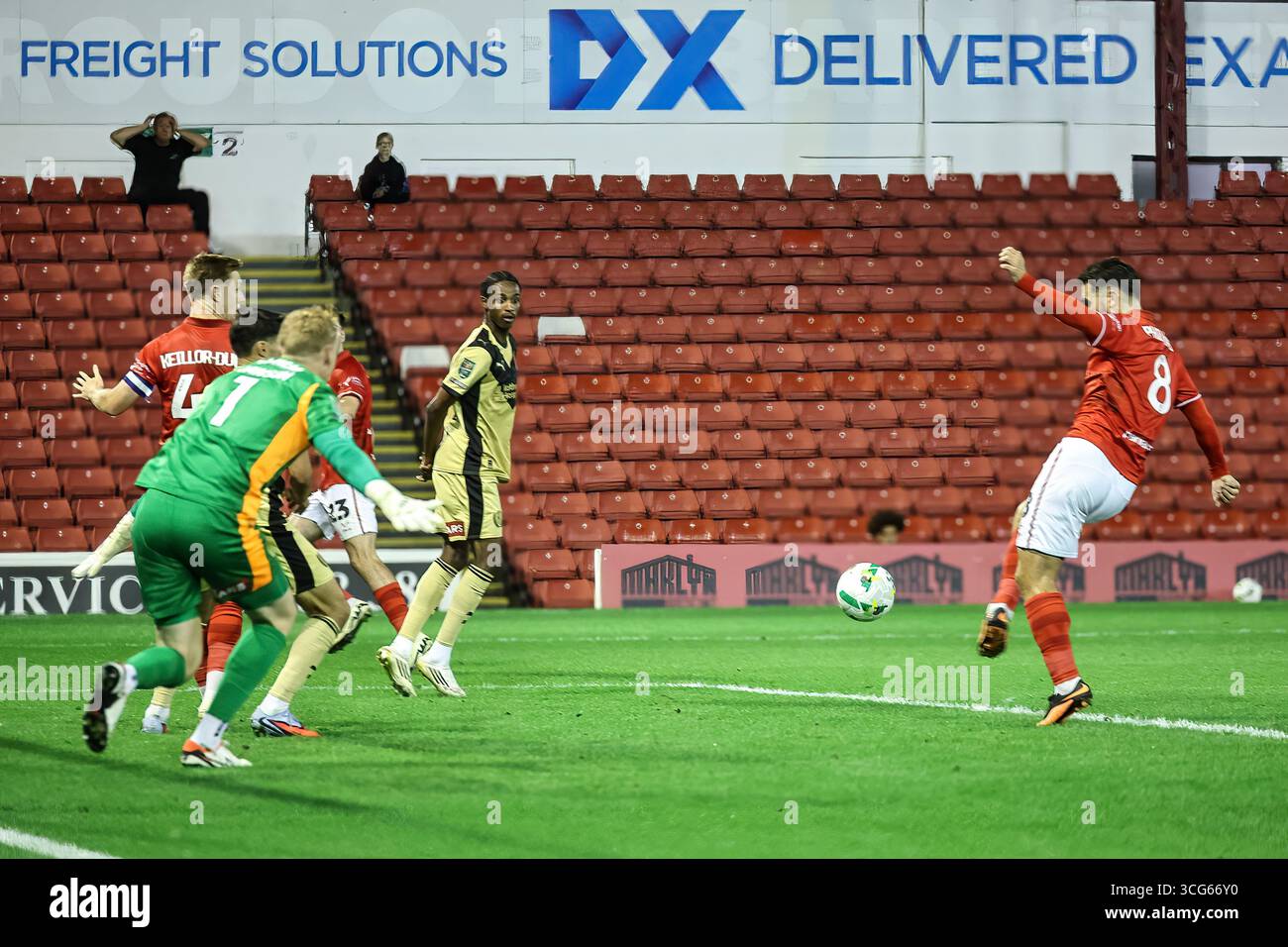 Adam Phillips of Barnsley scores to make it 2-1 during the Carabao Cup ...