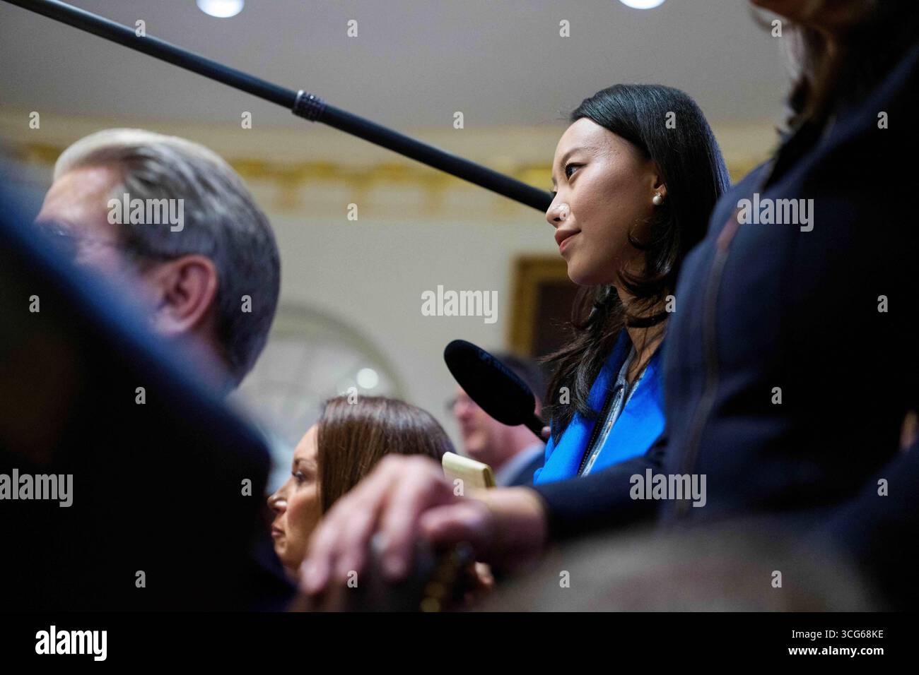 Iris Tao, Epoch Times reporter, listens to a Cabinet Meeting in the Cabinet Room of the White ...