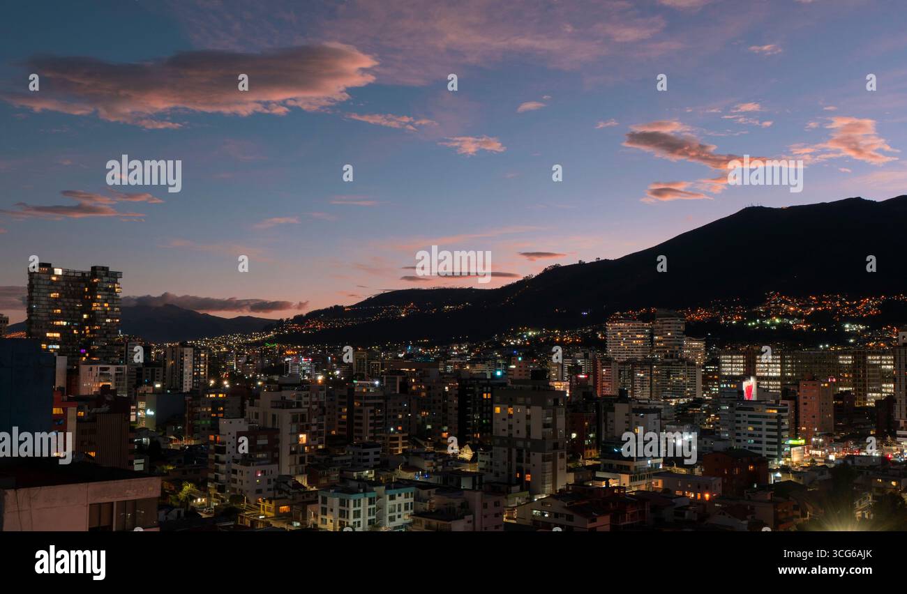 Panoramic view of the northern part of Quito during the evening with ...
