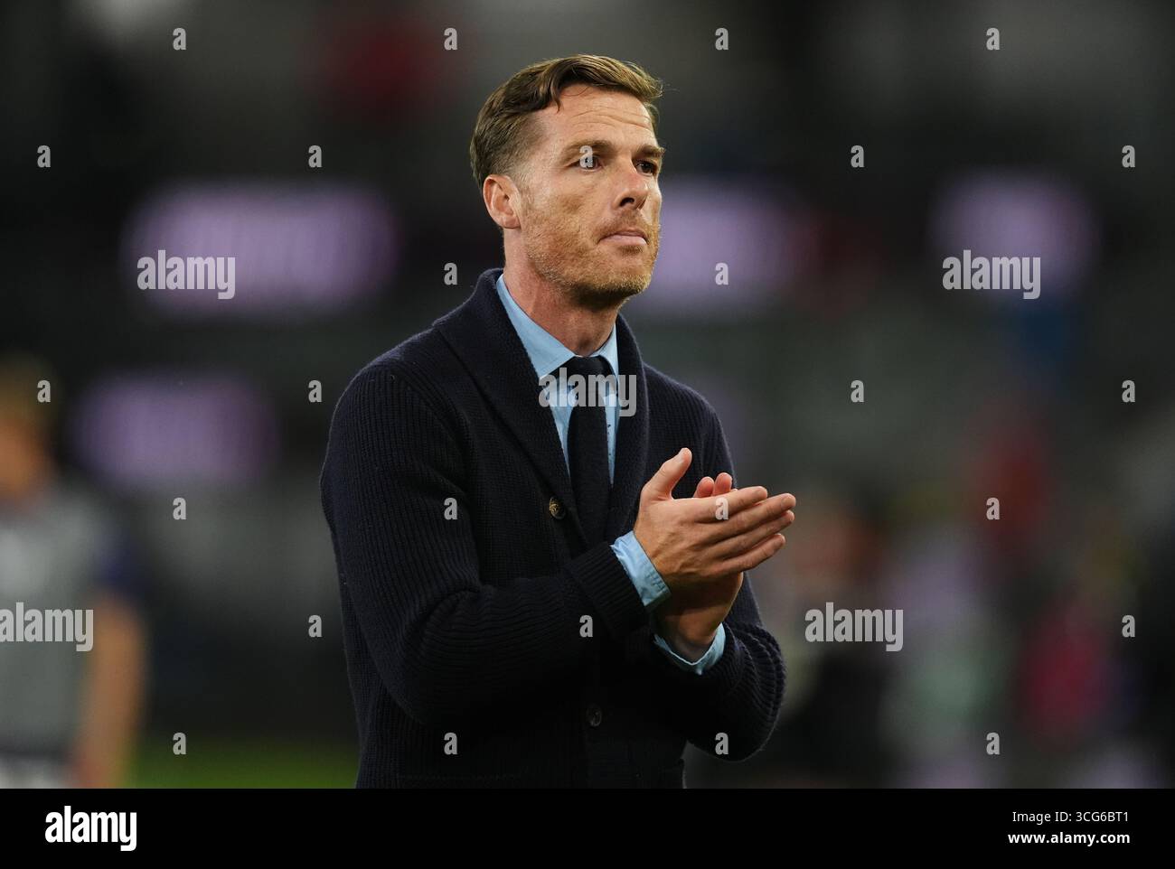 Burnley manager Scott Parker applauds the fans after the Carabao Cup ...