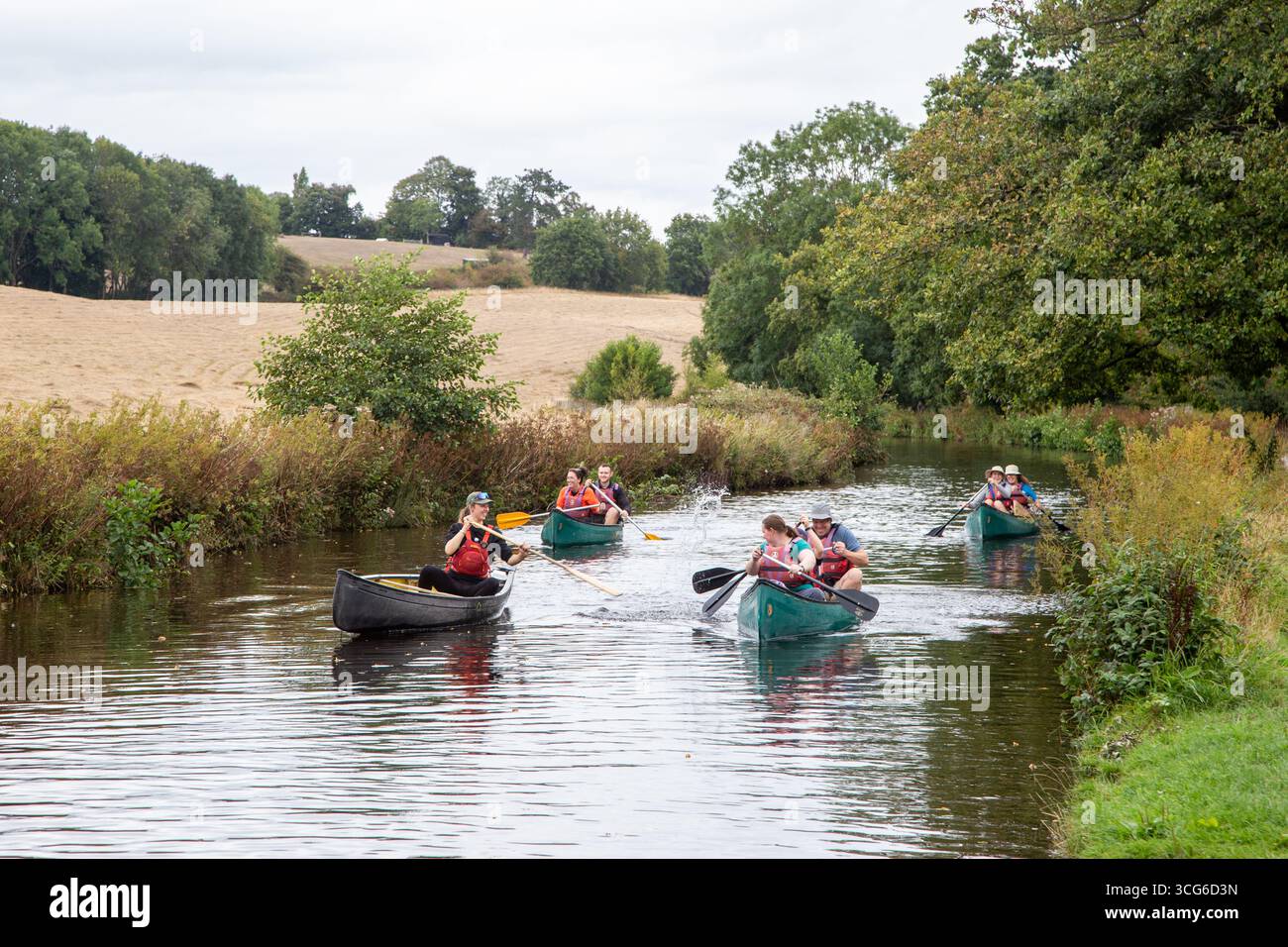 People canoeing and kayaking on the Llangollen canal in the North Wales ...