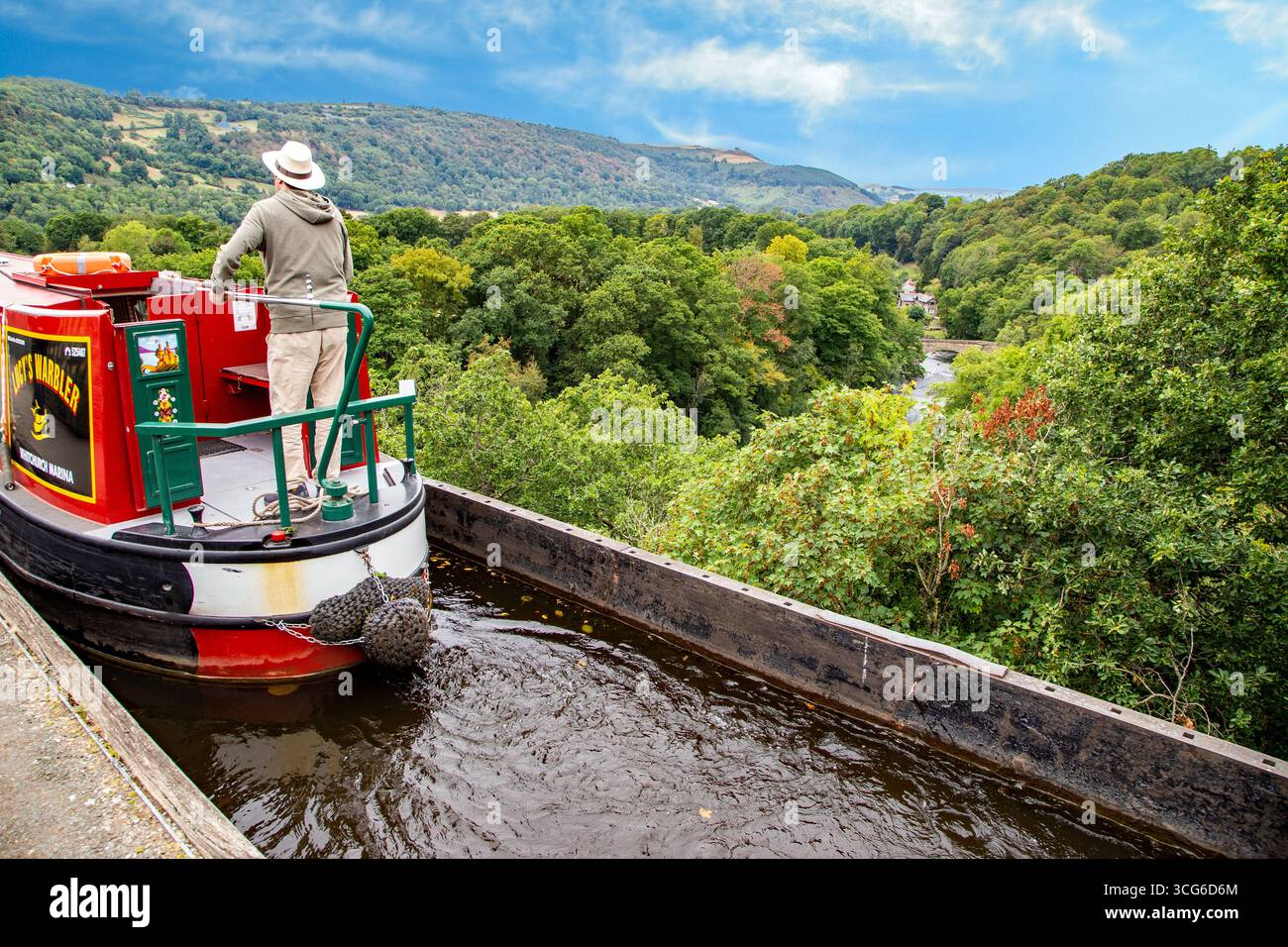 Canal narrowboat crossing 38 meters above the river Dee valley on the ...