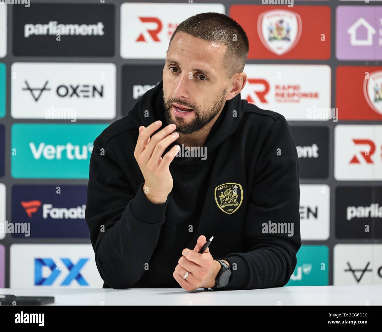 Conor Hourihane manager of Barnsley speaks in the post match press ...
