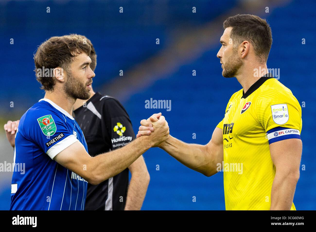 Calum Chambers of Cardiff City with Cheltenham Town goalkeeper Joe Day ...