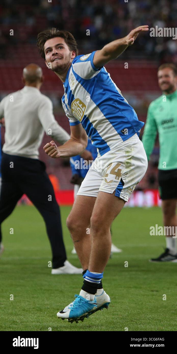 Leo Castledine of Huddersfield Town celebrates their penalty shootout ...